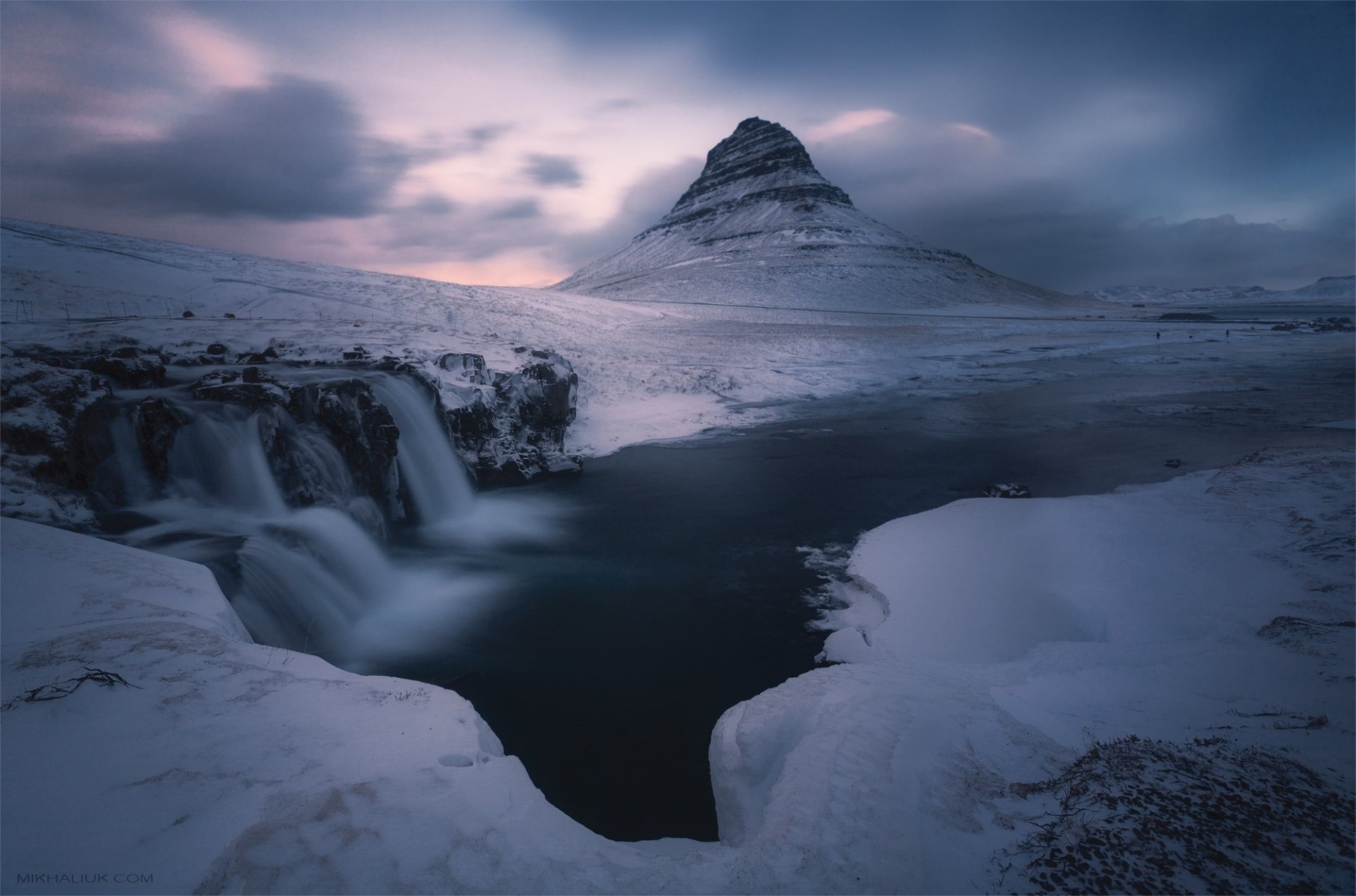 Winter’s Whisper: Snow-Covered Waterfall in HD Nature
