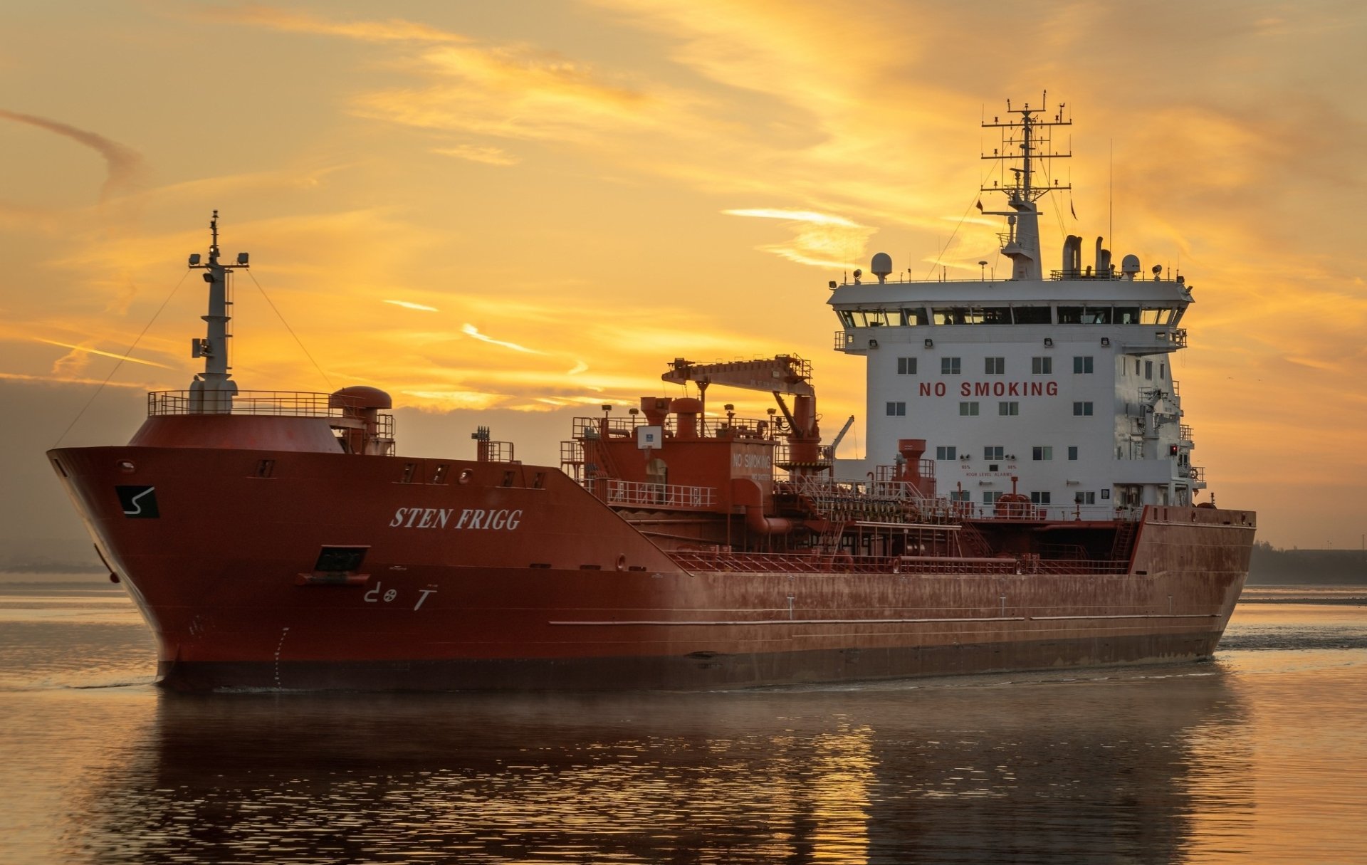 Sunset Voyage: Stunning HD Tanker Vessel in Motion