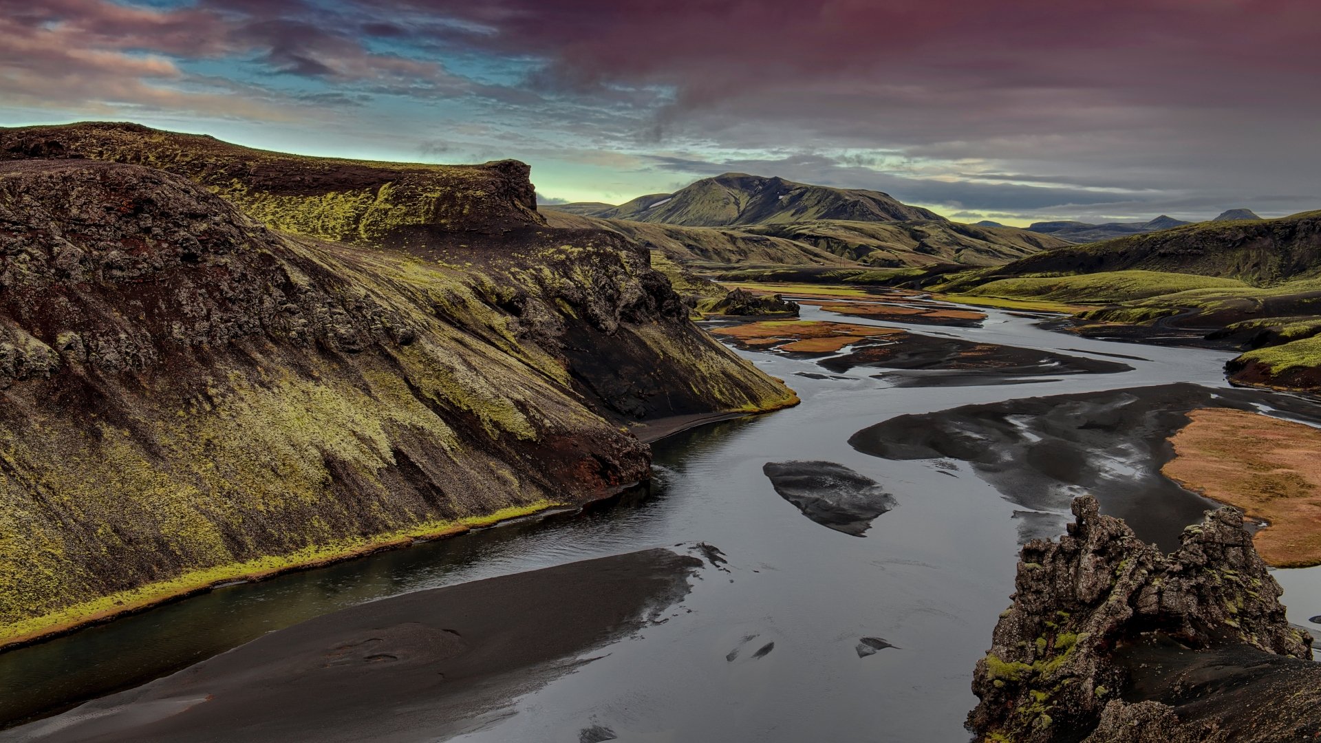 4K Ultra HD Serenity: Majestic River Winding Through Untamed Nature