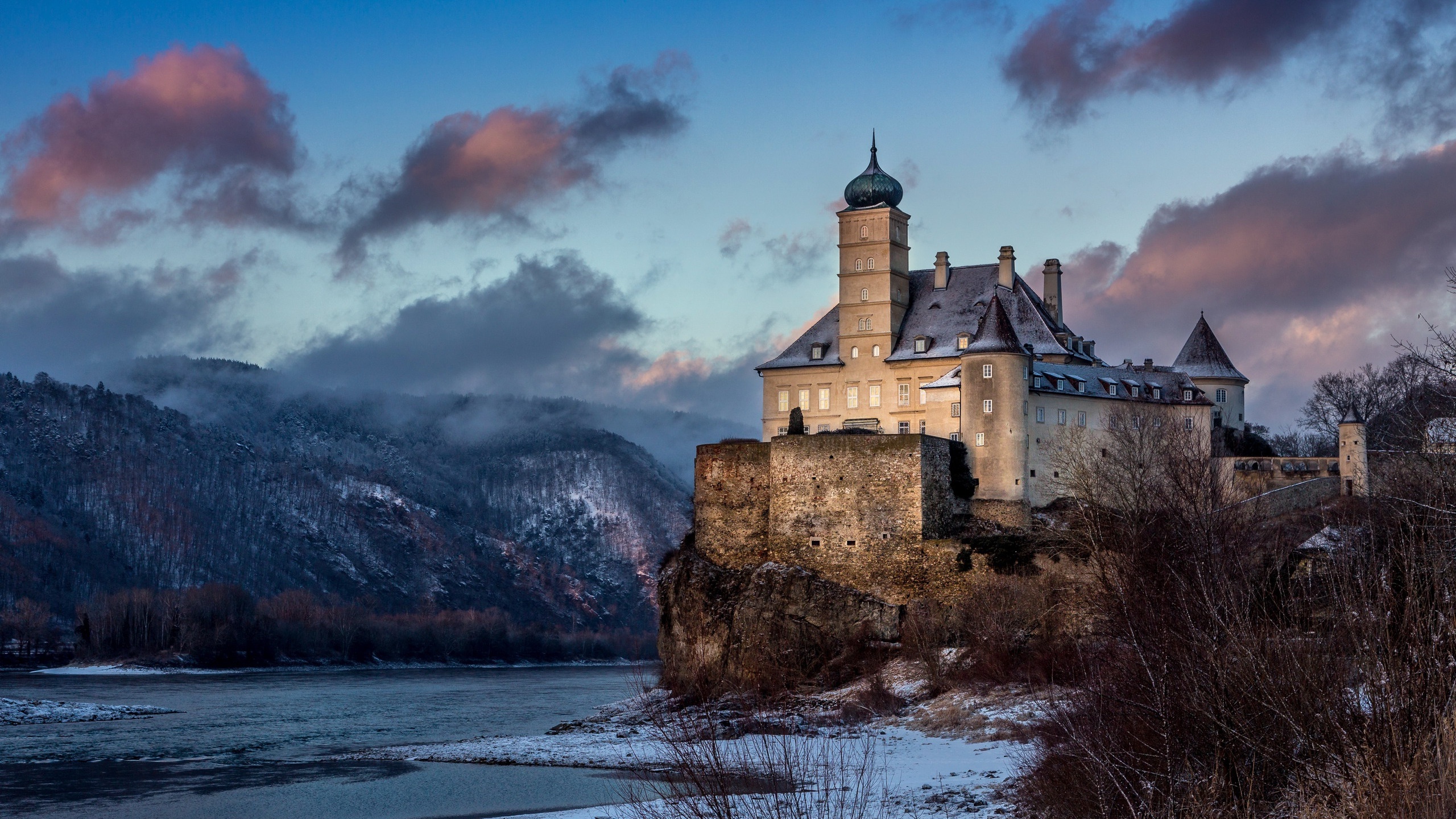 Majestic Man-Made Castle Overlooking Winter River – HD Wallpaper
