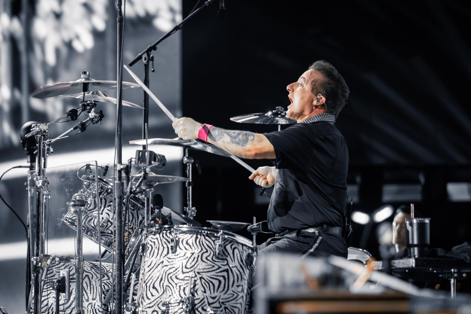 Tré Cool: Rock & Roll Energy in 4K Ultra HD Wallpaper