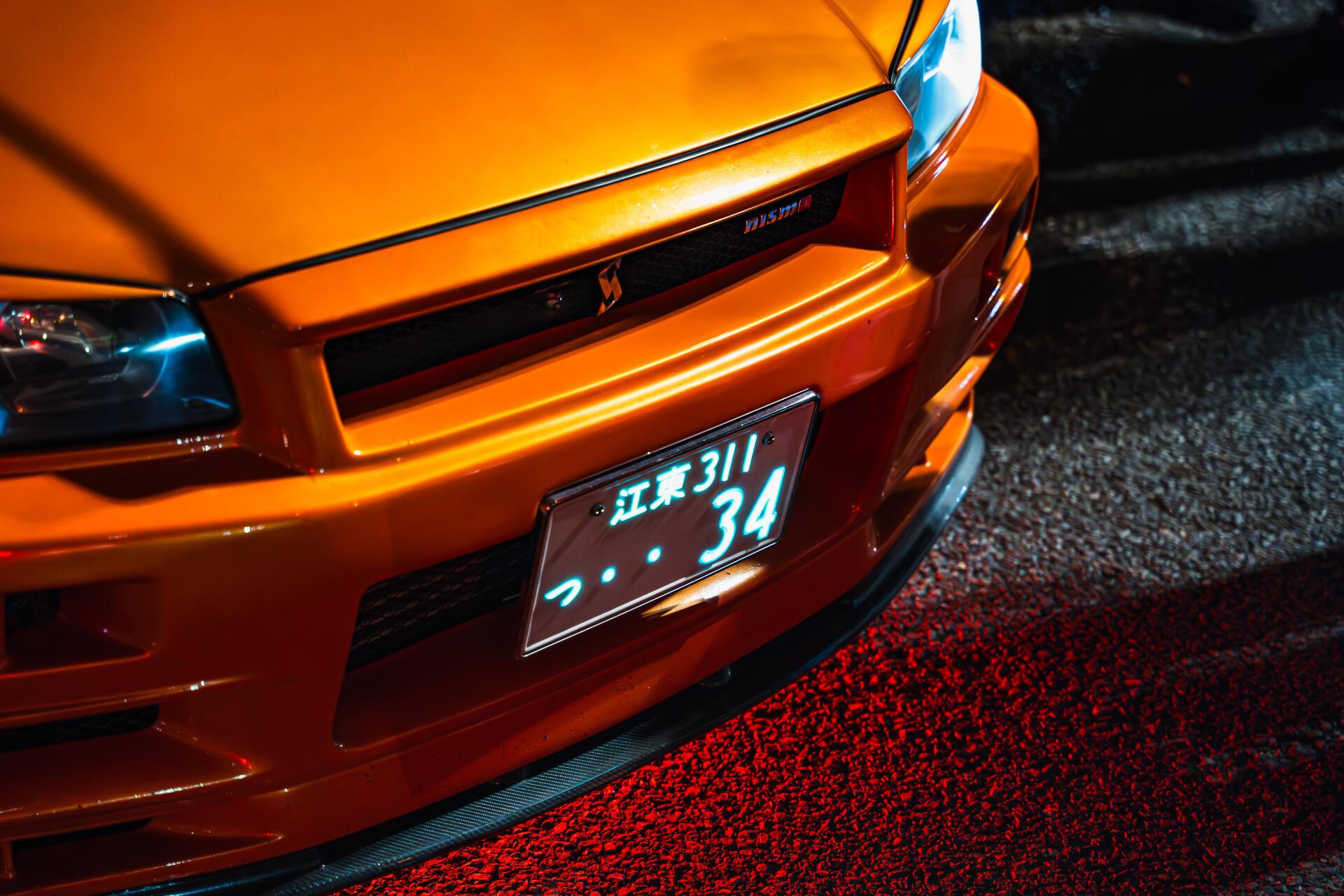 4K Ultra HD Wallpaper of Orange Nissan Skyline GT-R R34 Front View