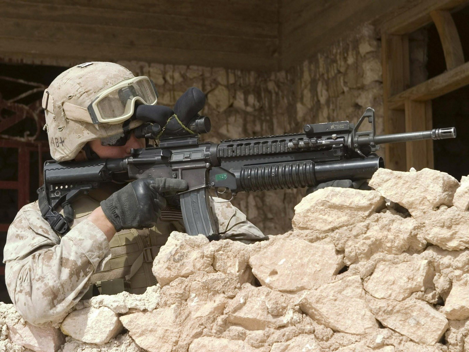 HD Military Precision: Soldier Armed with AR-15 Rifle in Action
