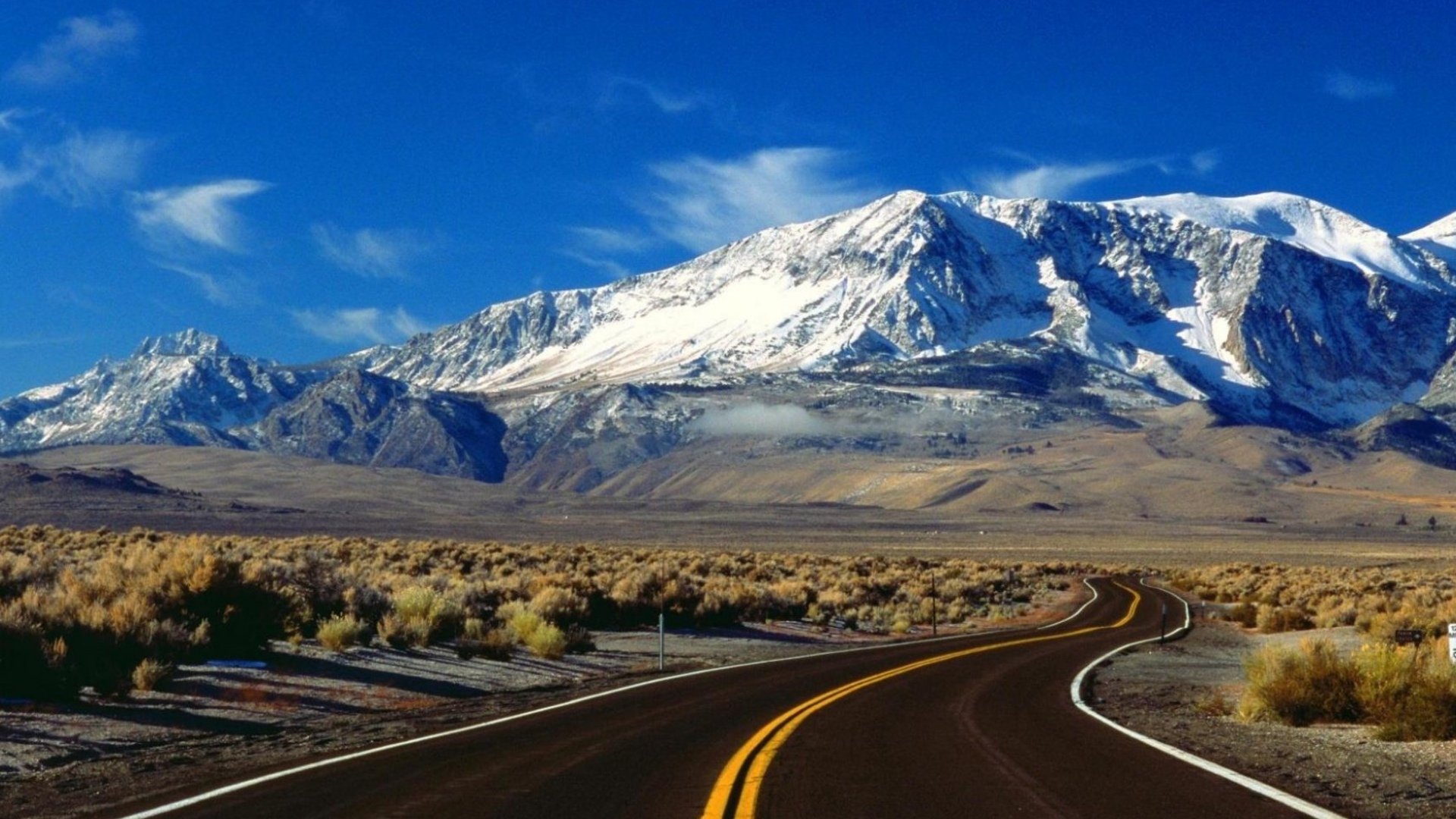 Endless Journey: Man-Made Road Meets Majestic Mountains HD Wallpaper ...
