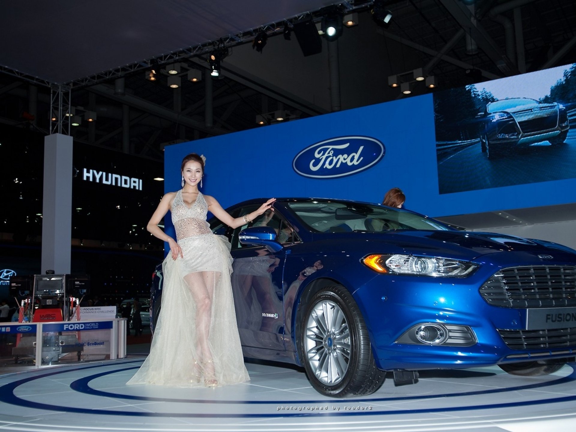 Elegance Meets Power: Stunning Women & Cars HD Wallpaper