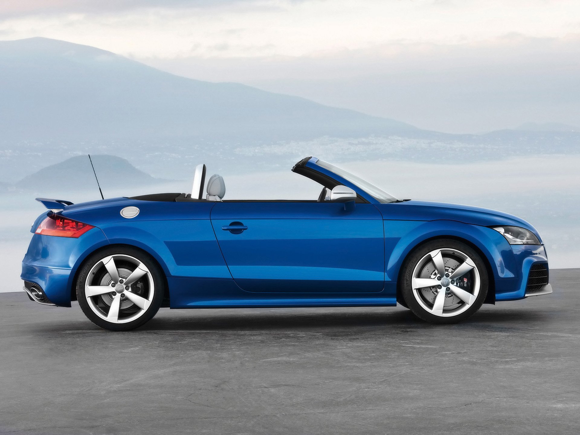 Audi Convertible HD Wallpaper – Sleek Blue Vehicle in Motion