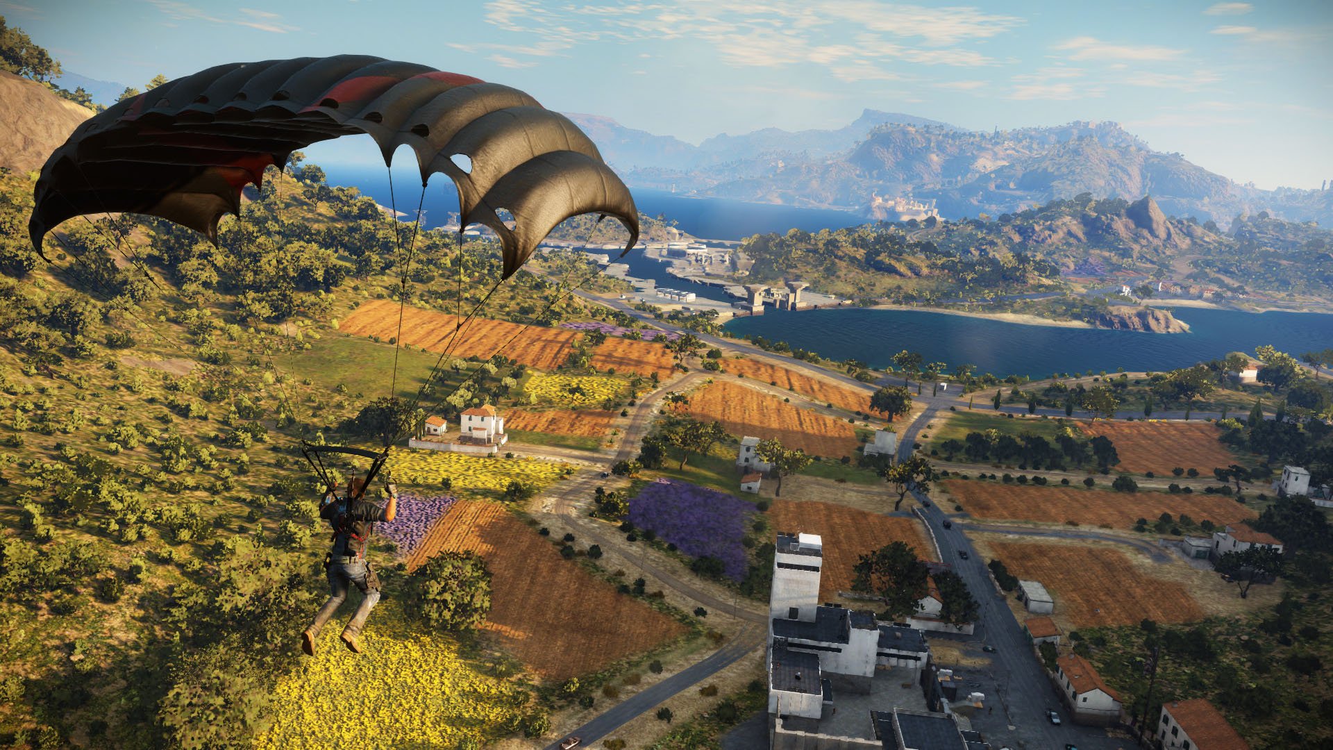 Just Cause 3 HD Wallpaper: Rico Rodriguez Soars Over Stunning Island Vista