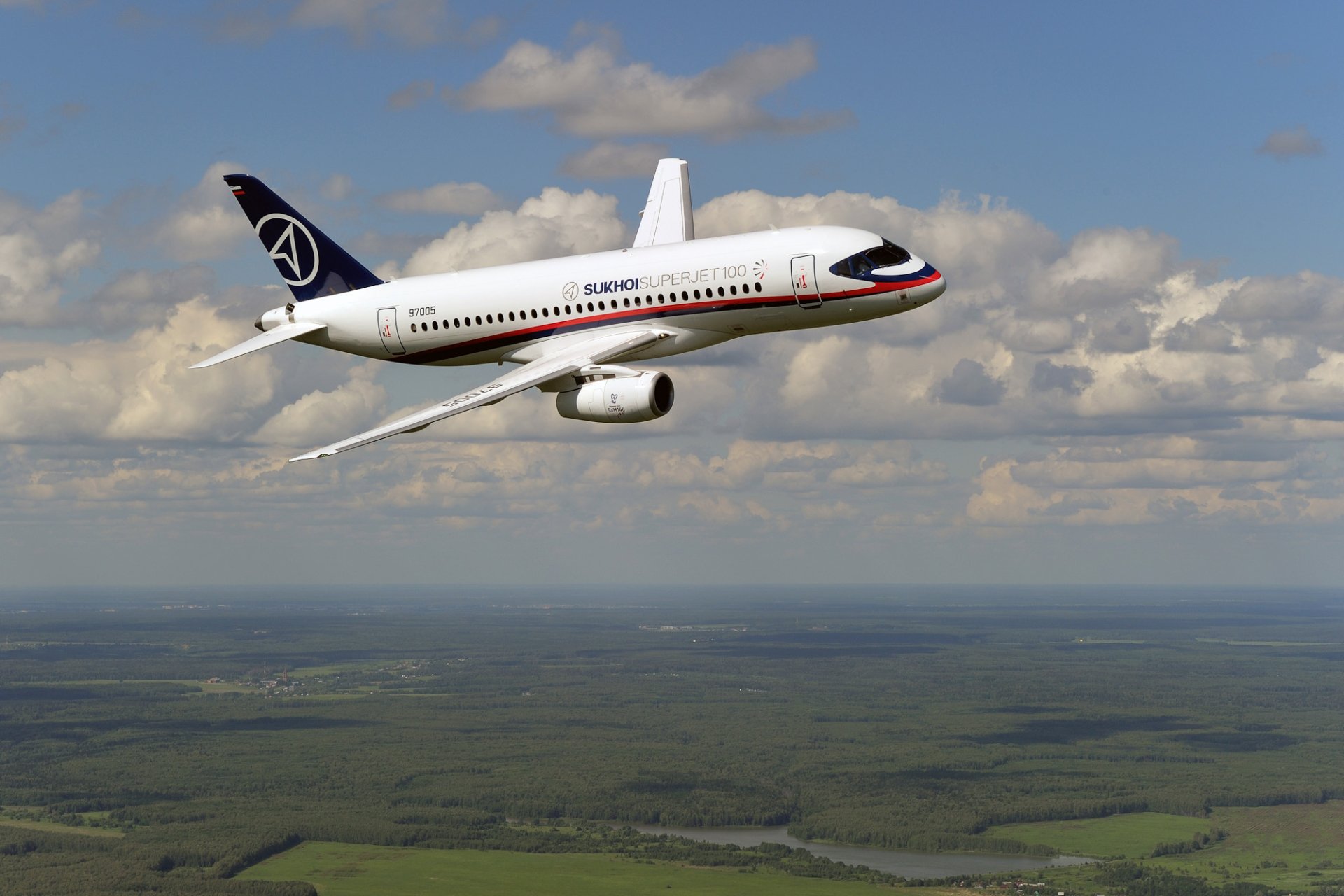 Sukhoi SuperJet 100 Jet Soaring High – HD Airplane Wallpaper