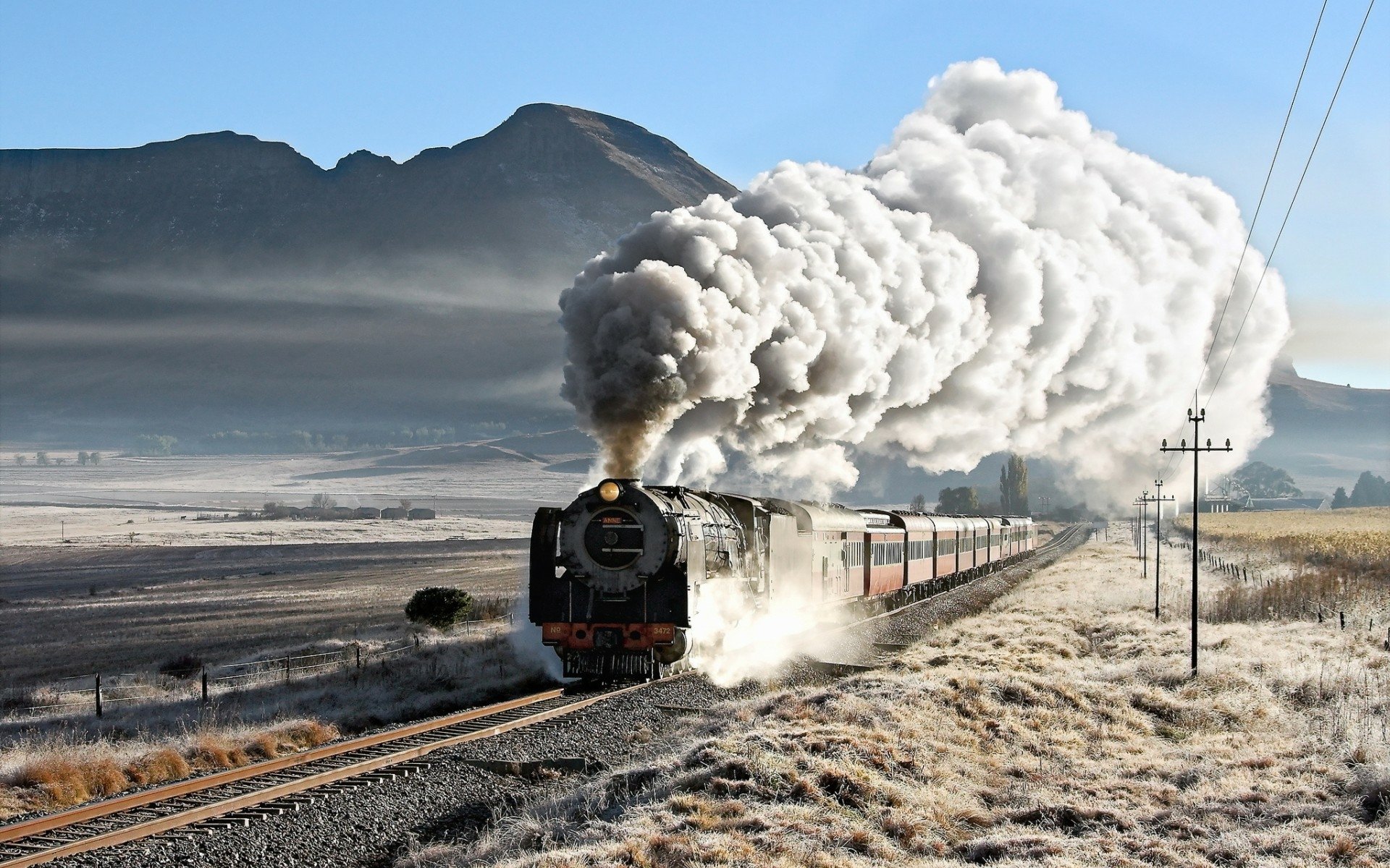 Majestic Steam Train: HD Wallpaper of a Locomotive in Action