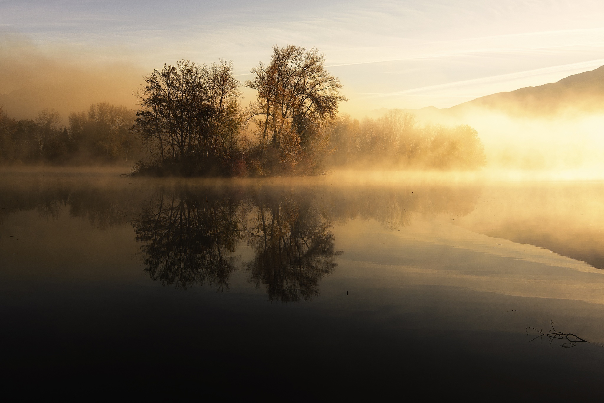 Misty Sunrise Reflection Over Tranquil Island Lake – HD Nature Wallpaper