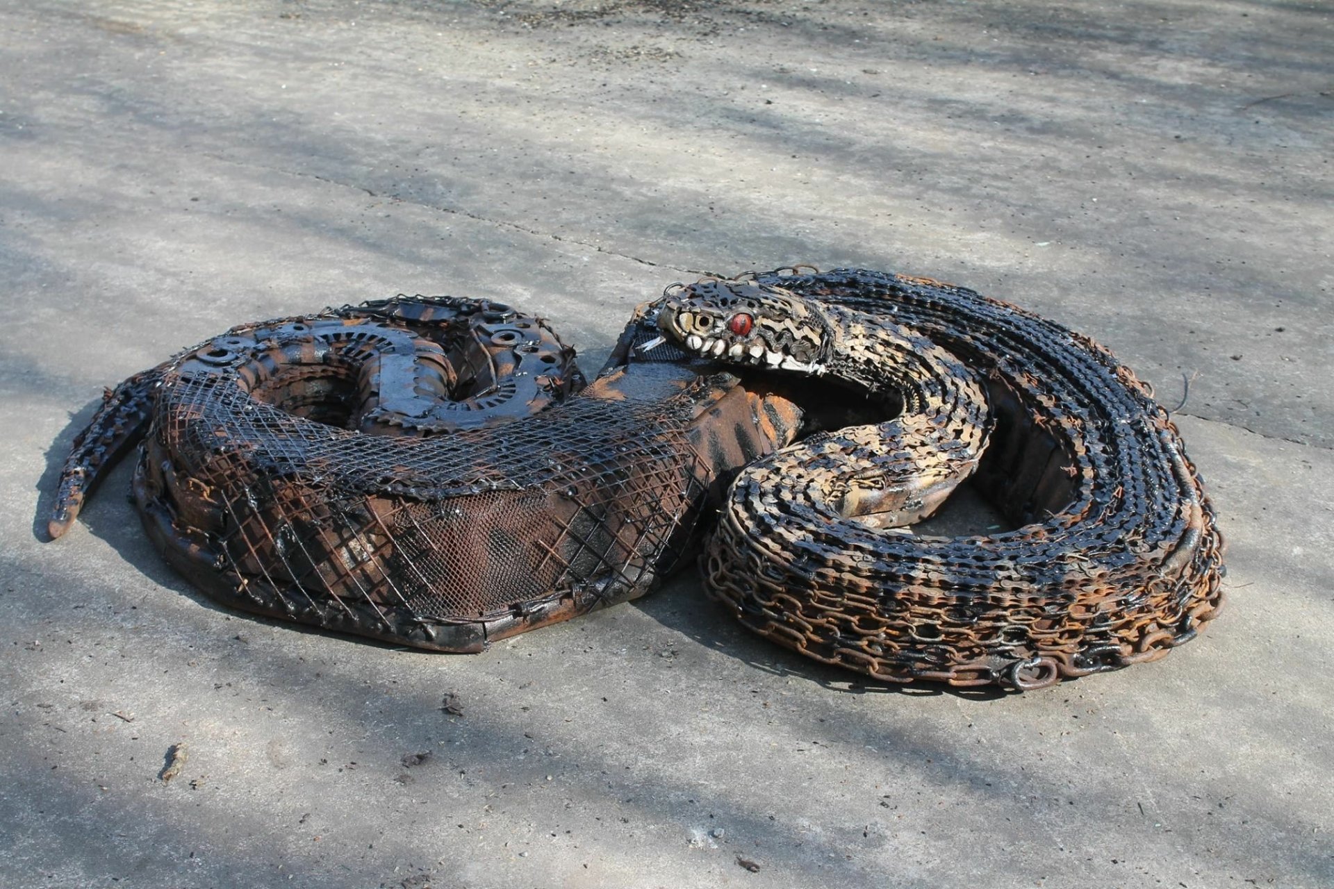 Serpent Forge: HD Scrap Metal Snake Sculpture Masterpiece by John Brown