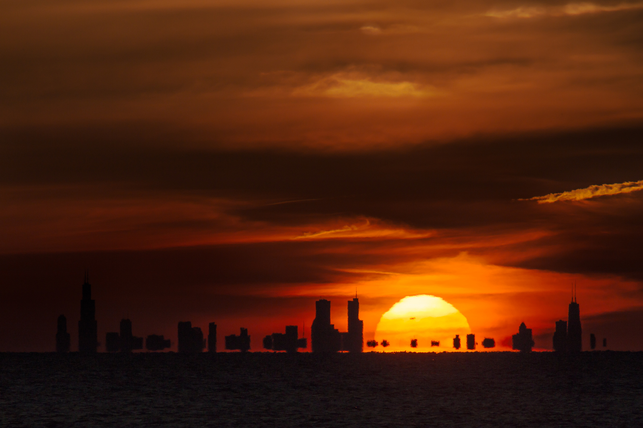 Sunset Silhouette: Vibrant Orange Skyline HD Wallpaper by John Crouch