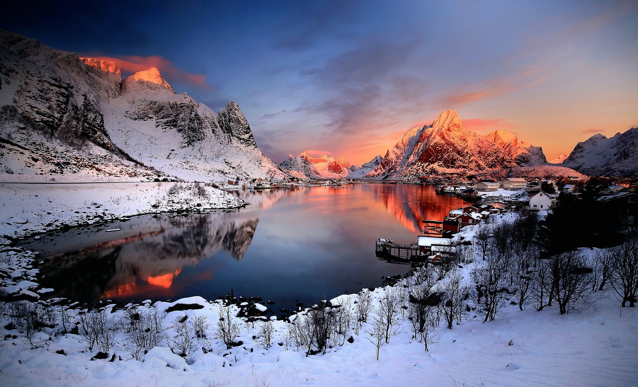 Winter Twilight: Snowy Mountain Village by the Lake – HD Wallpaper