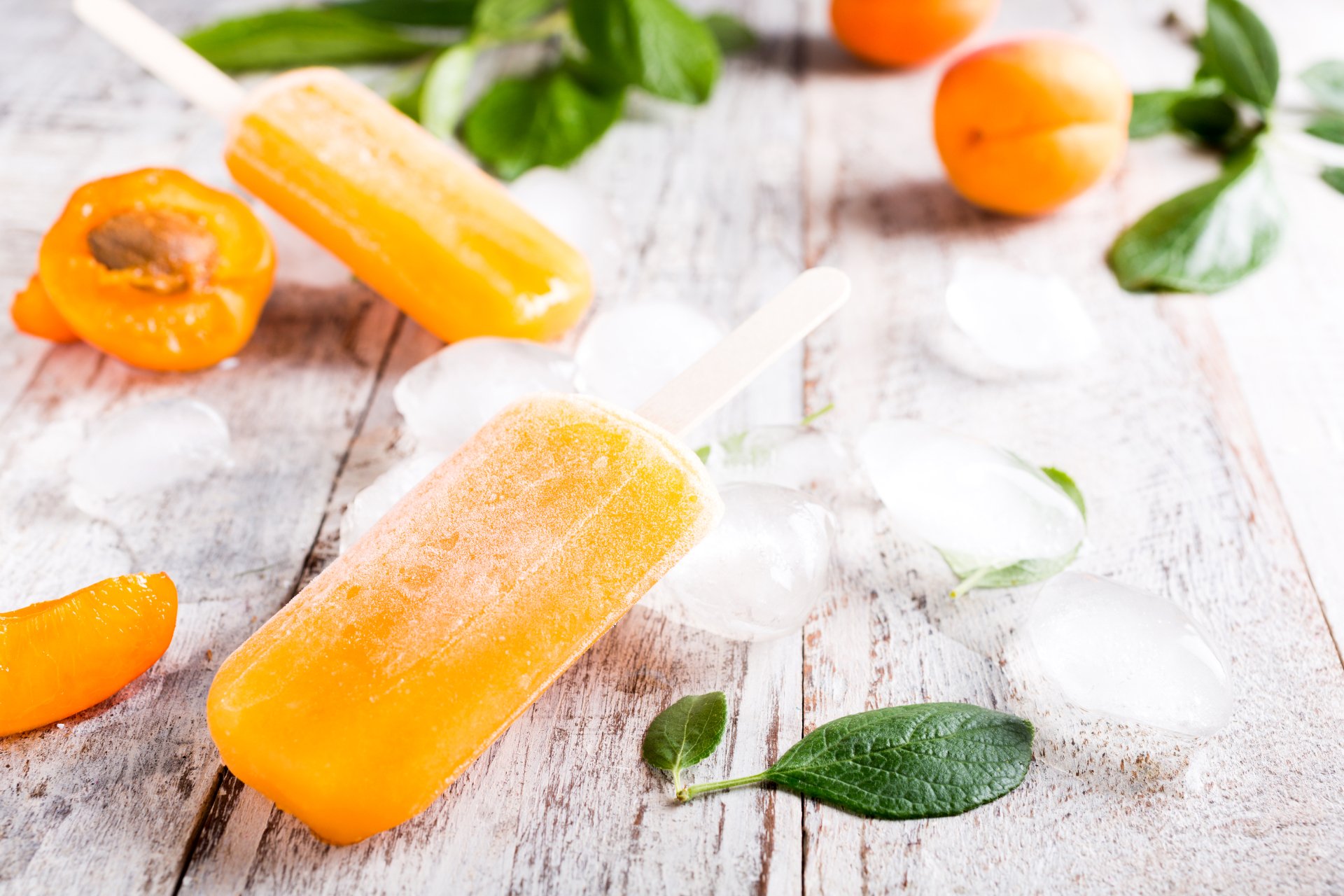 Refreshing Apricot Popsicle Delight – 4K Ultra HD Still Life Wallpaper