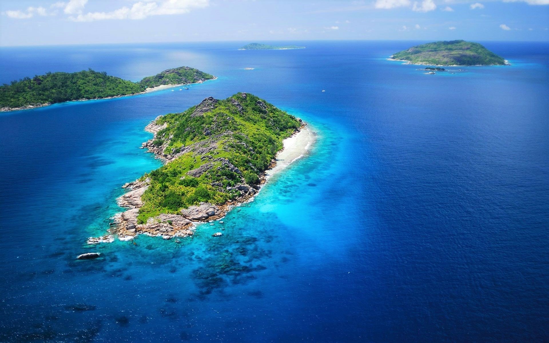 Seychelles Horizon: Tropical Island Over Azure Sea